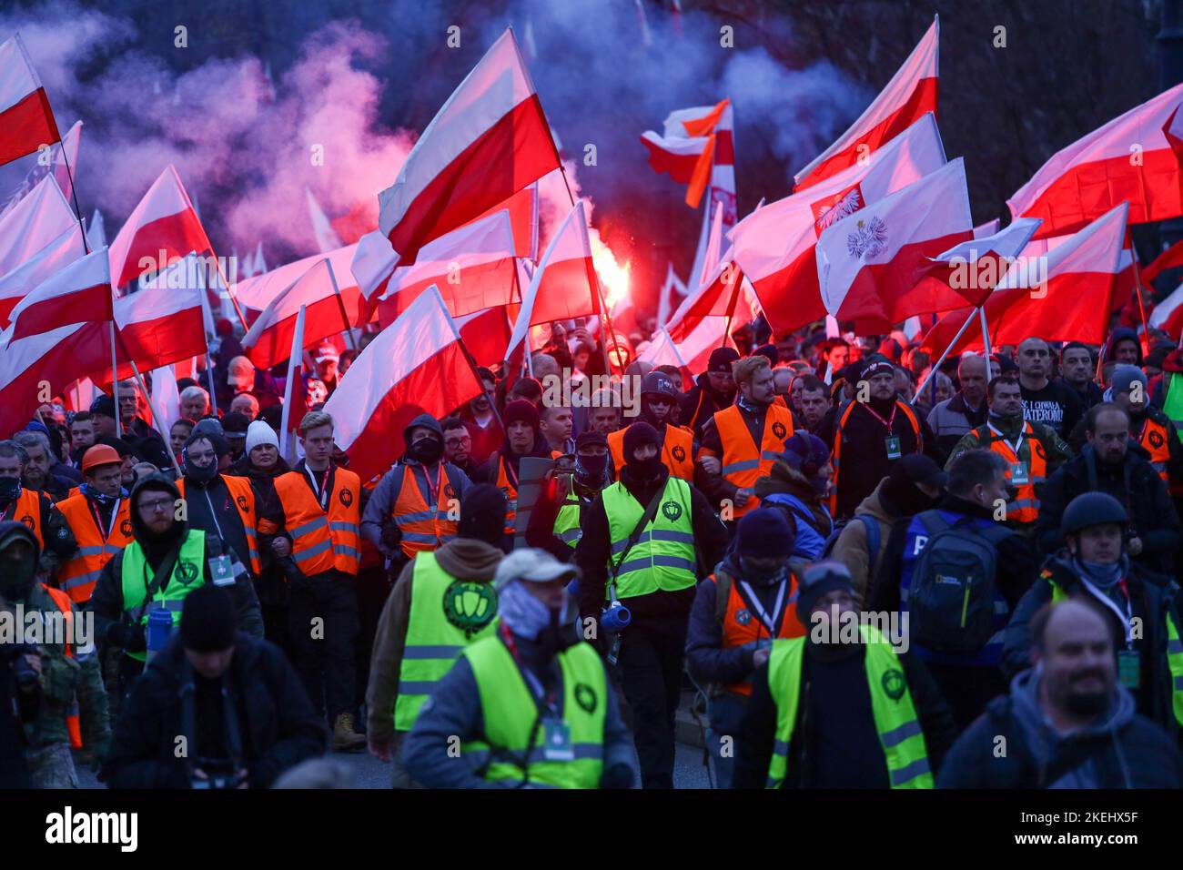 People march with flags during the celebration. On November 11, a march ...