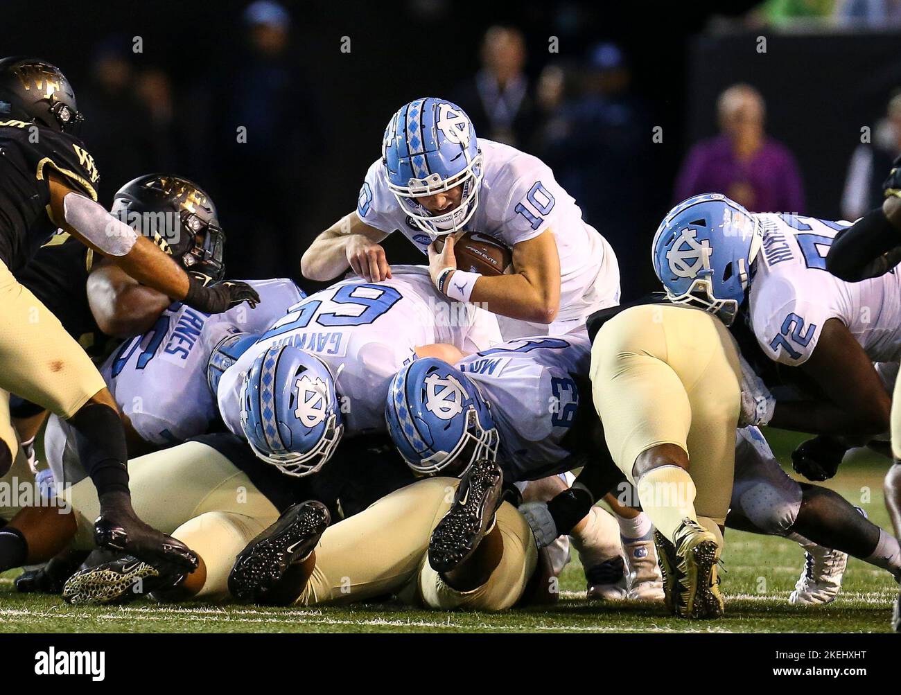 November 12, 2022: North Carolina freshman Drake Maye (10) dives over ...