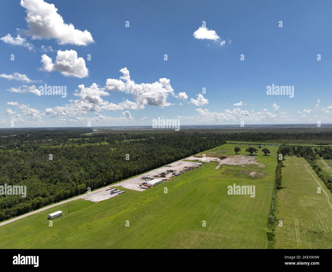 An aerial view of green grass field on a sunny day Stock Photo - Alamy
