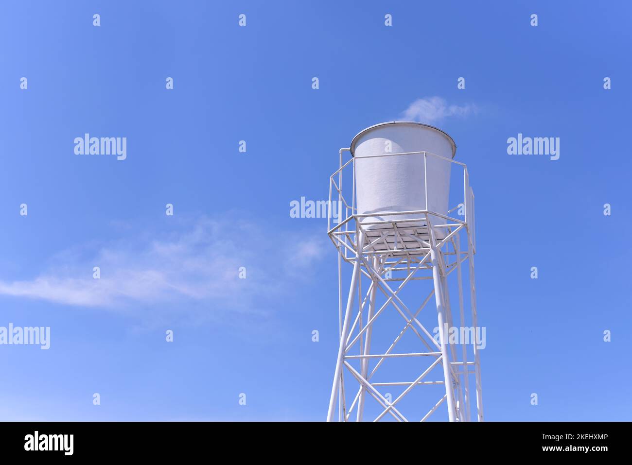 white Water tank in village, water supply with blue sky cloud ...