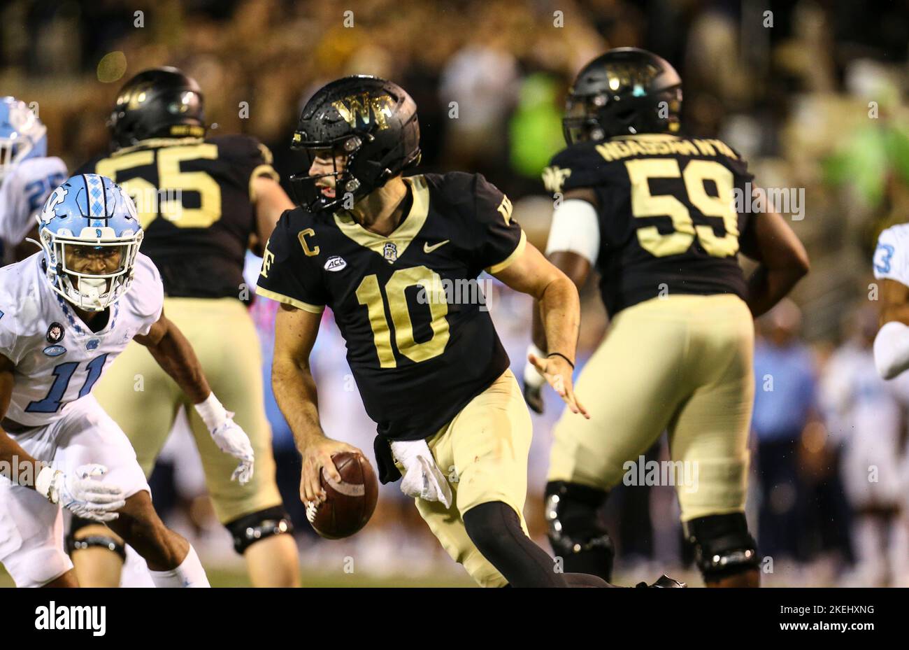 November 12, 2022: Wake Forest junior Sam Hartman (10) scrambles away ...