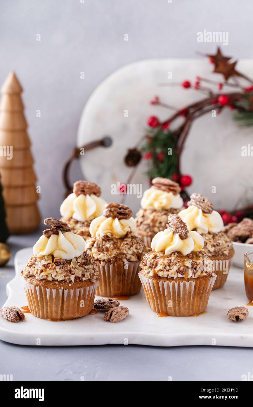 Candied pecan cupcakes with cream cheese frosting and caramel Stock ...