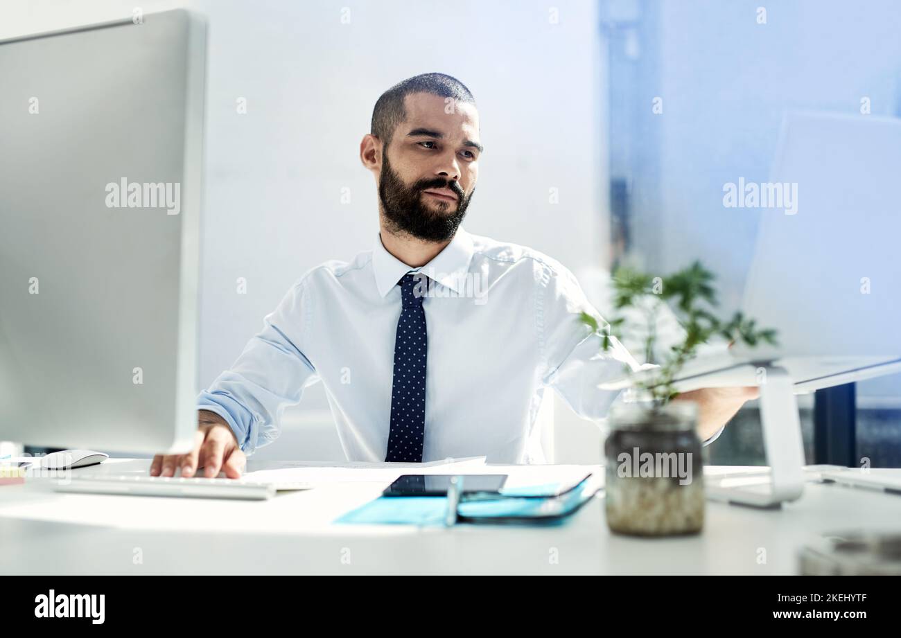 Multitasking young businessman inside office hi-res stock photography ...