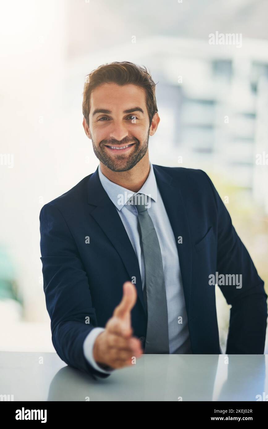 Lets accomplish great things together. Portrait of a handsome young ...