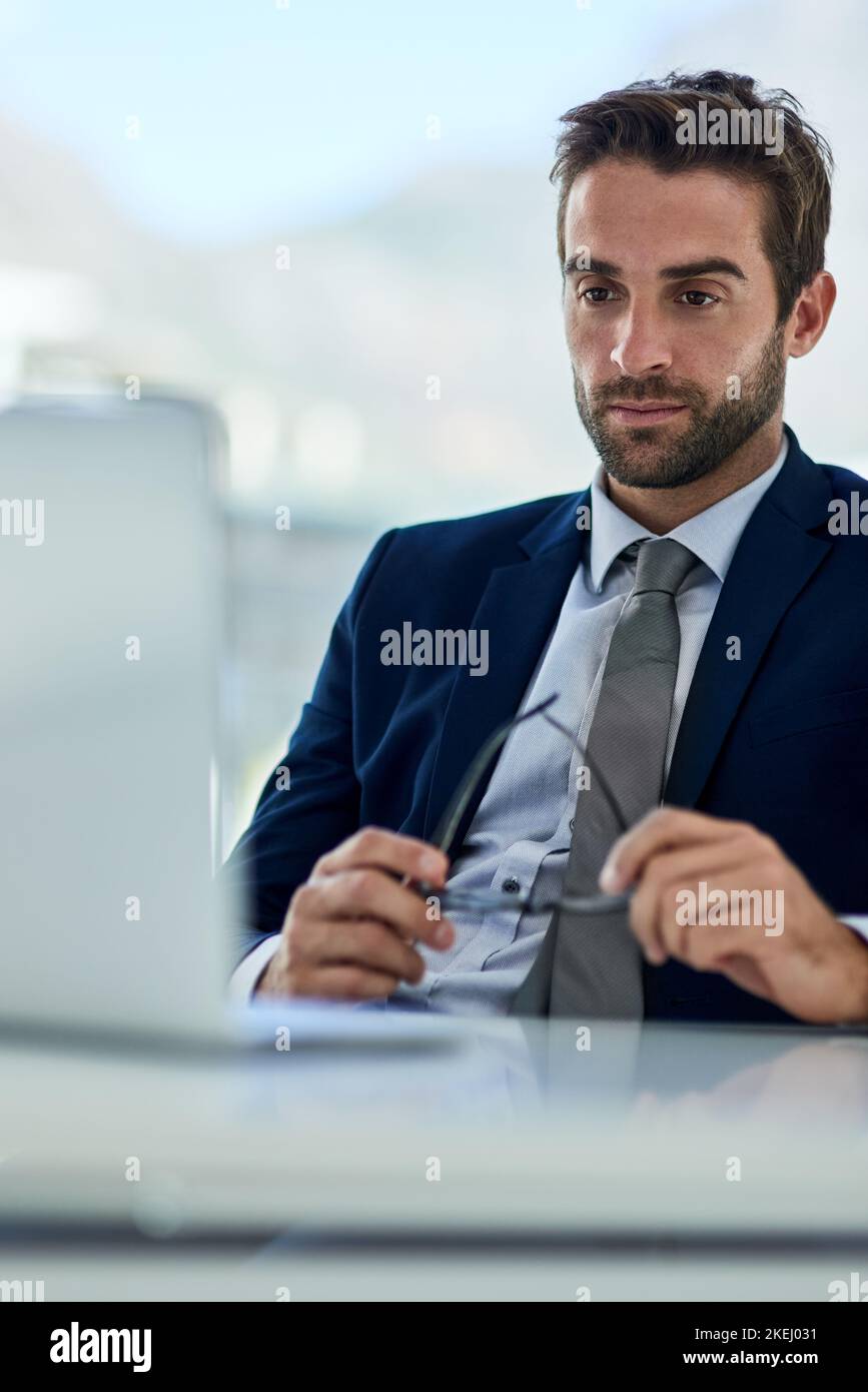 Planning the best business strategies. a young corporate businessman ...
