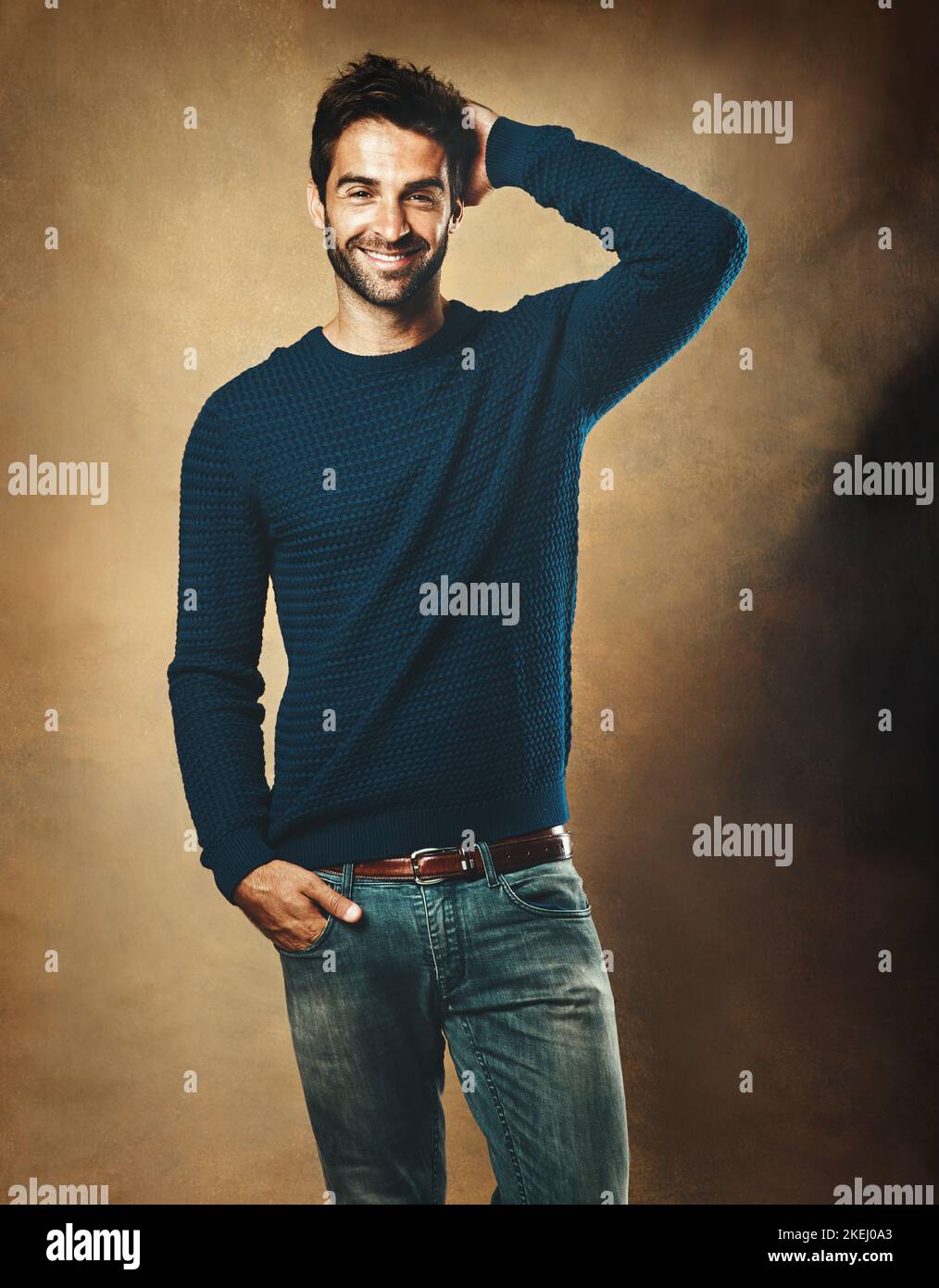He makes casual look super stylish. Studio portrait of a handsome young ...