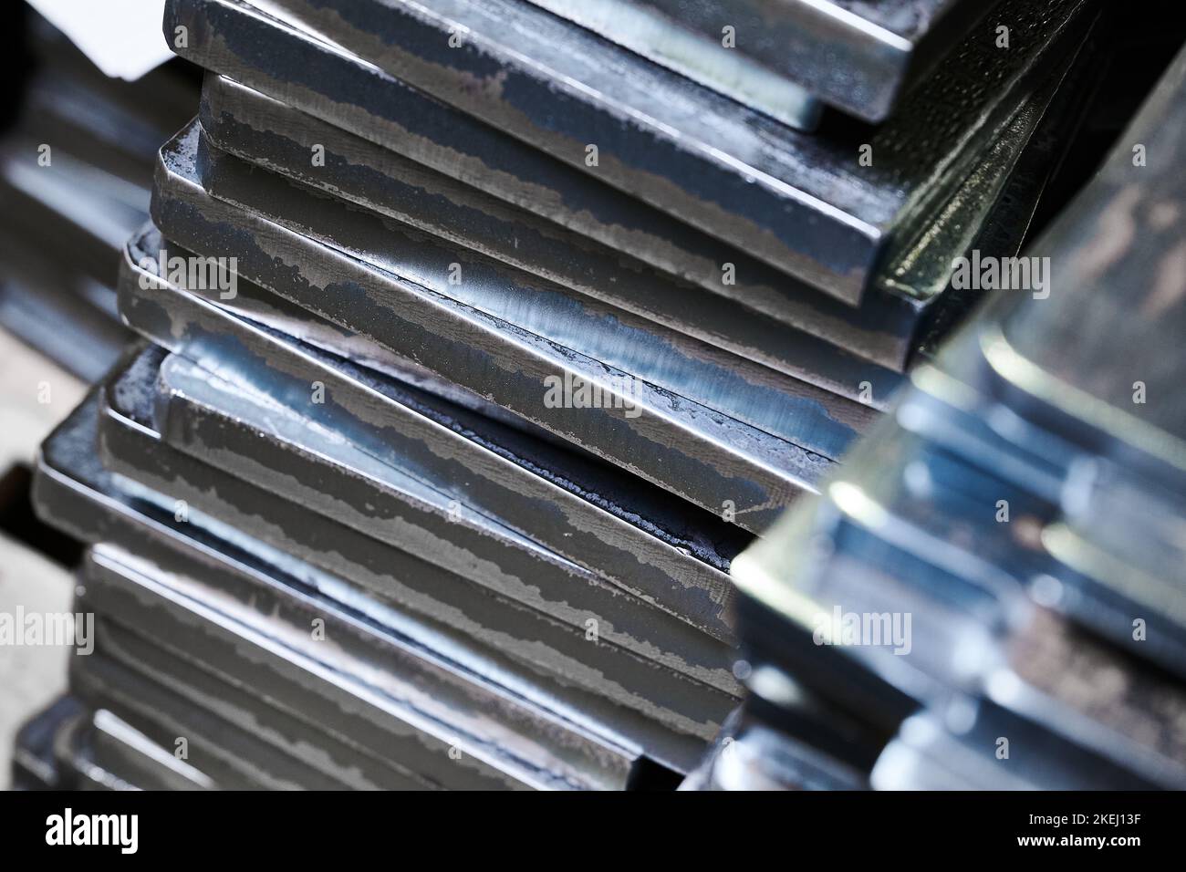 Shiny rectangle metal details in warehouse Stock Photo - Alamy