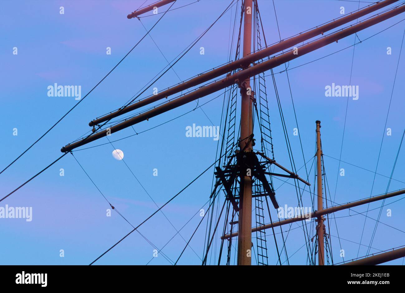 Sailing ship mast night and moon. Anchored seagoing vessel in port with ...