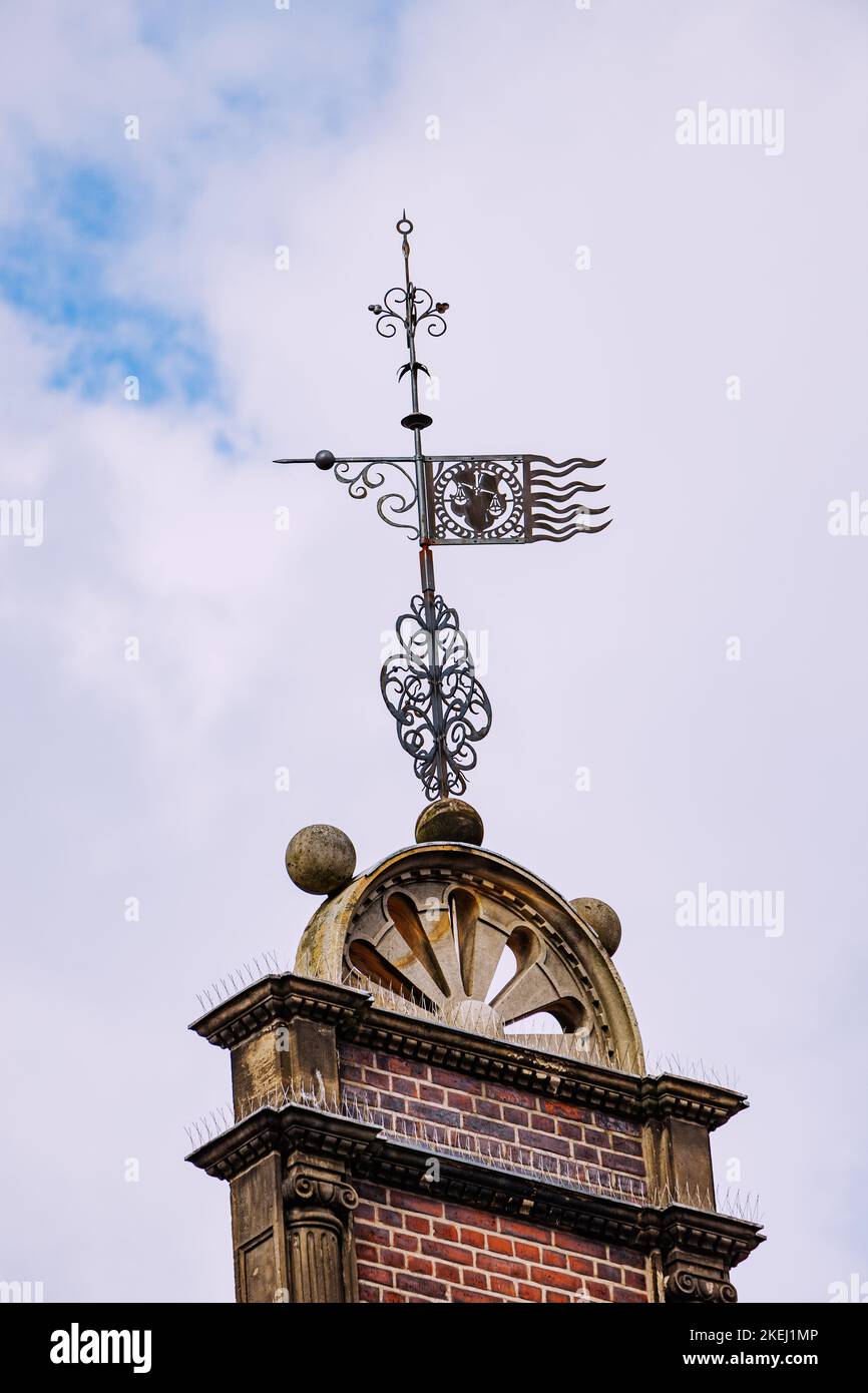 wind vane on the roof of a medieval building Stock Photo - Alamy