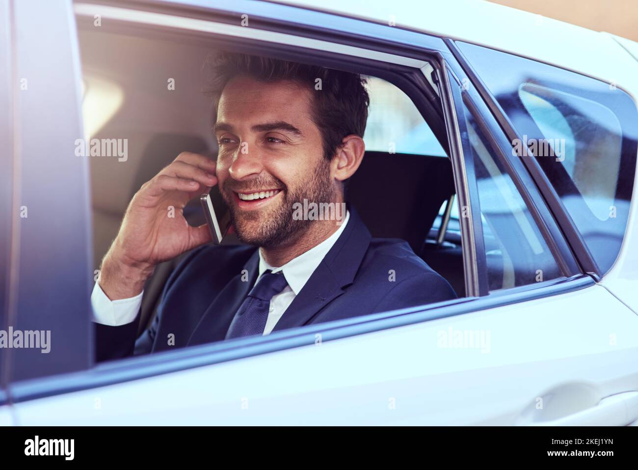 Im on my way to an important meeting. a businessman talking on the ...