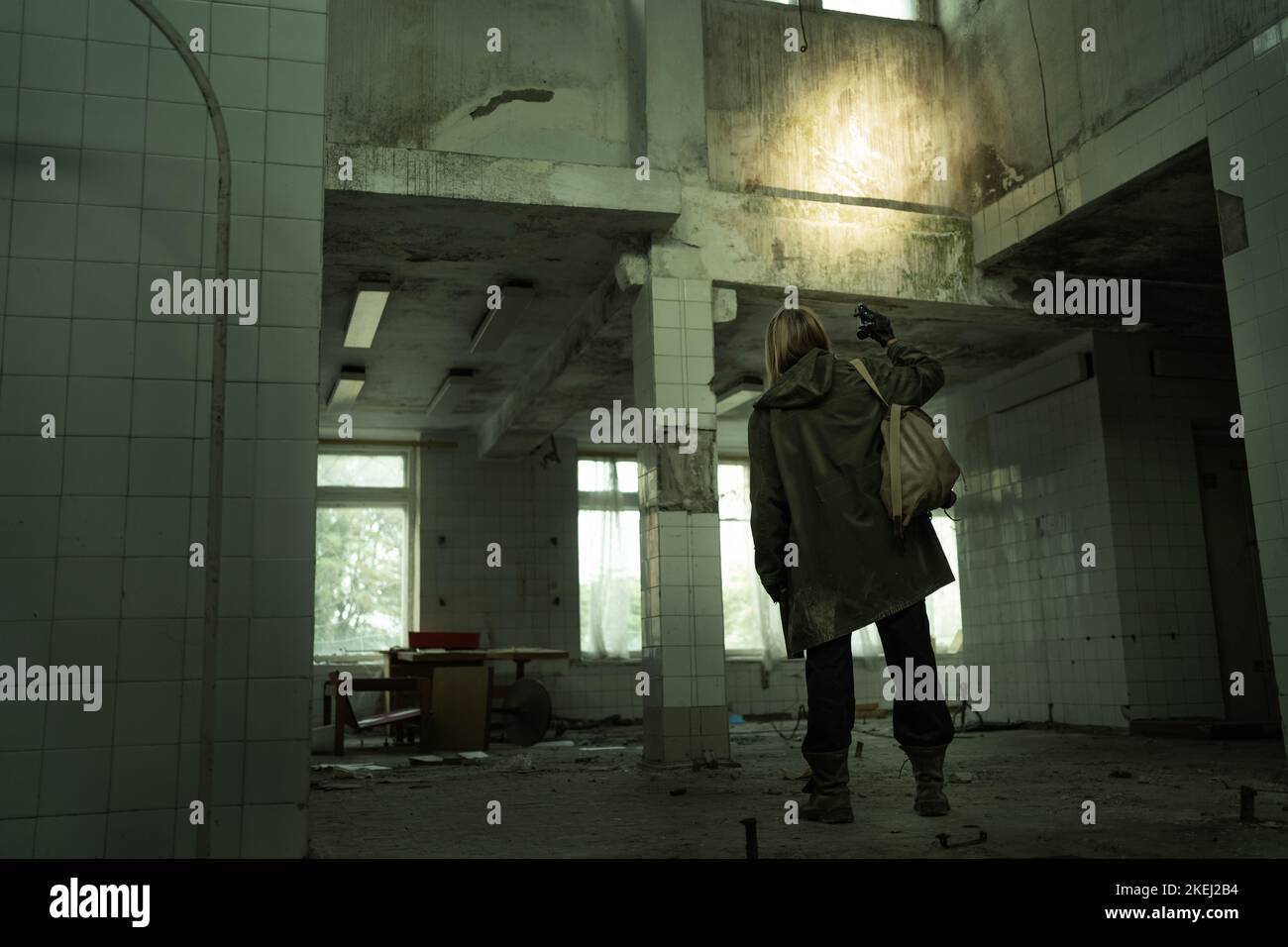 Nuclear disaster survivor in a post apocalyptic setting, woman stalker ...