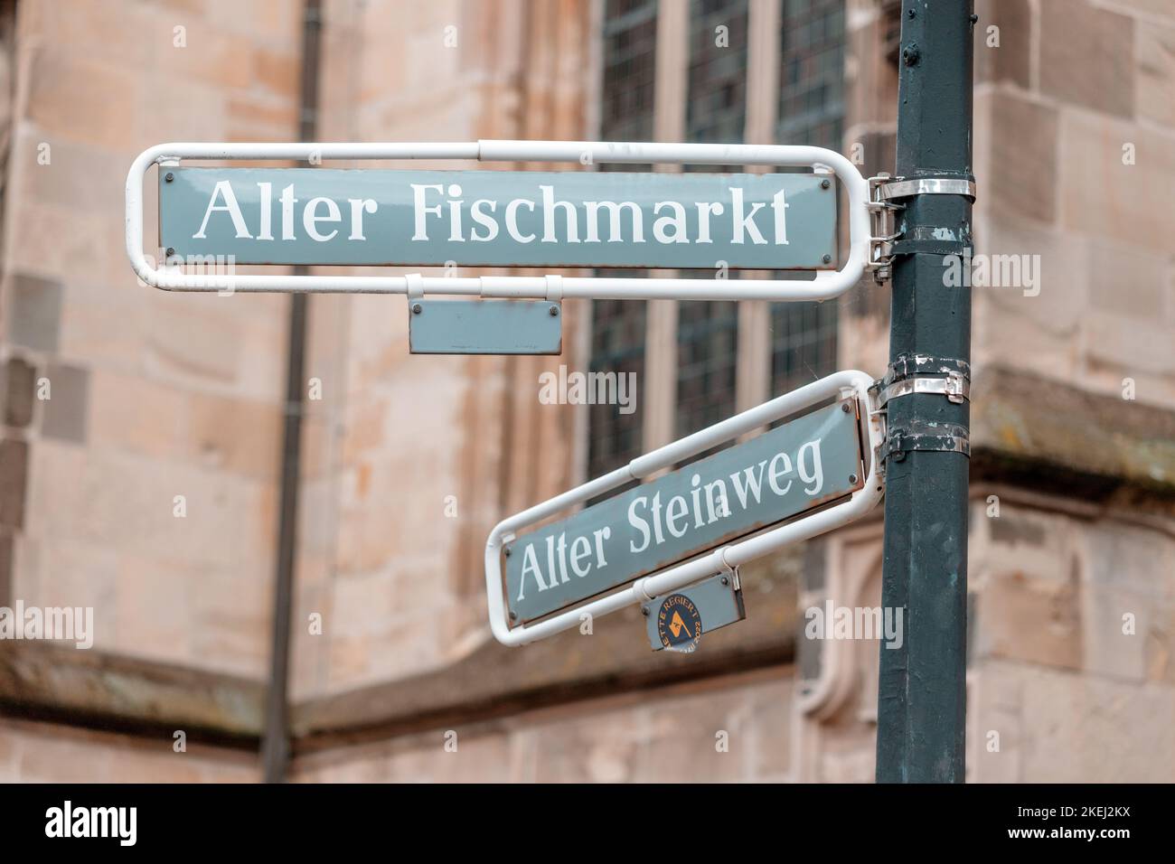 26 July 2022, Munster, Germany: city sign post pointer with street ...