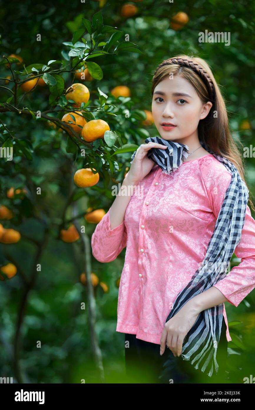 Western vietnamese costume hi-res stock photography and images - Alamy