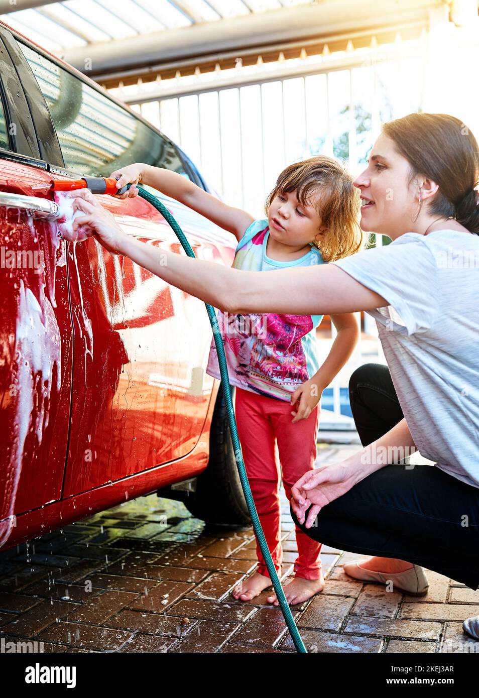 Kids washing car hi-res stock photography and images - Alamy