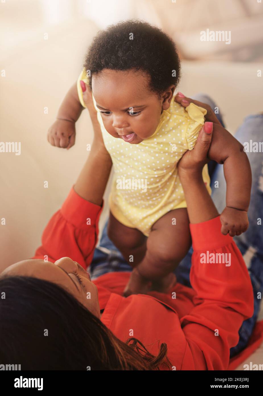 Shes a little bit of heaven. a mother holding her baby girl Stock Photo ...