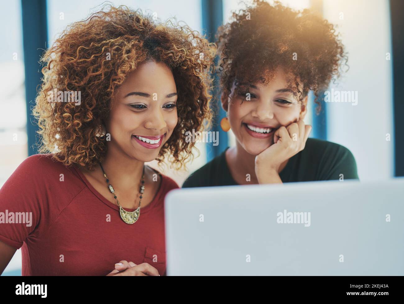 Dream together. two young designers working on a laptop together Stock ...