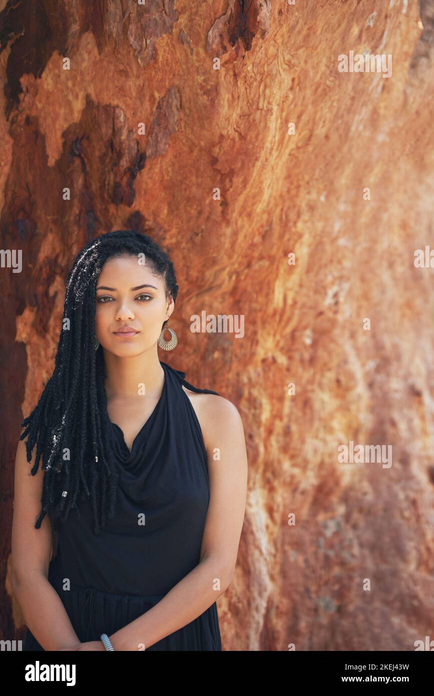 Natural beauty at its best. Portrait of an attractive young woman posing outdoors Stock Photo ...