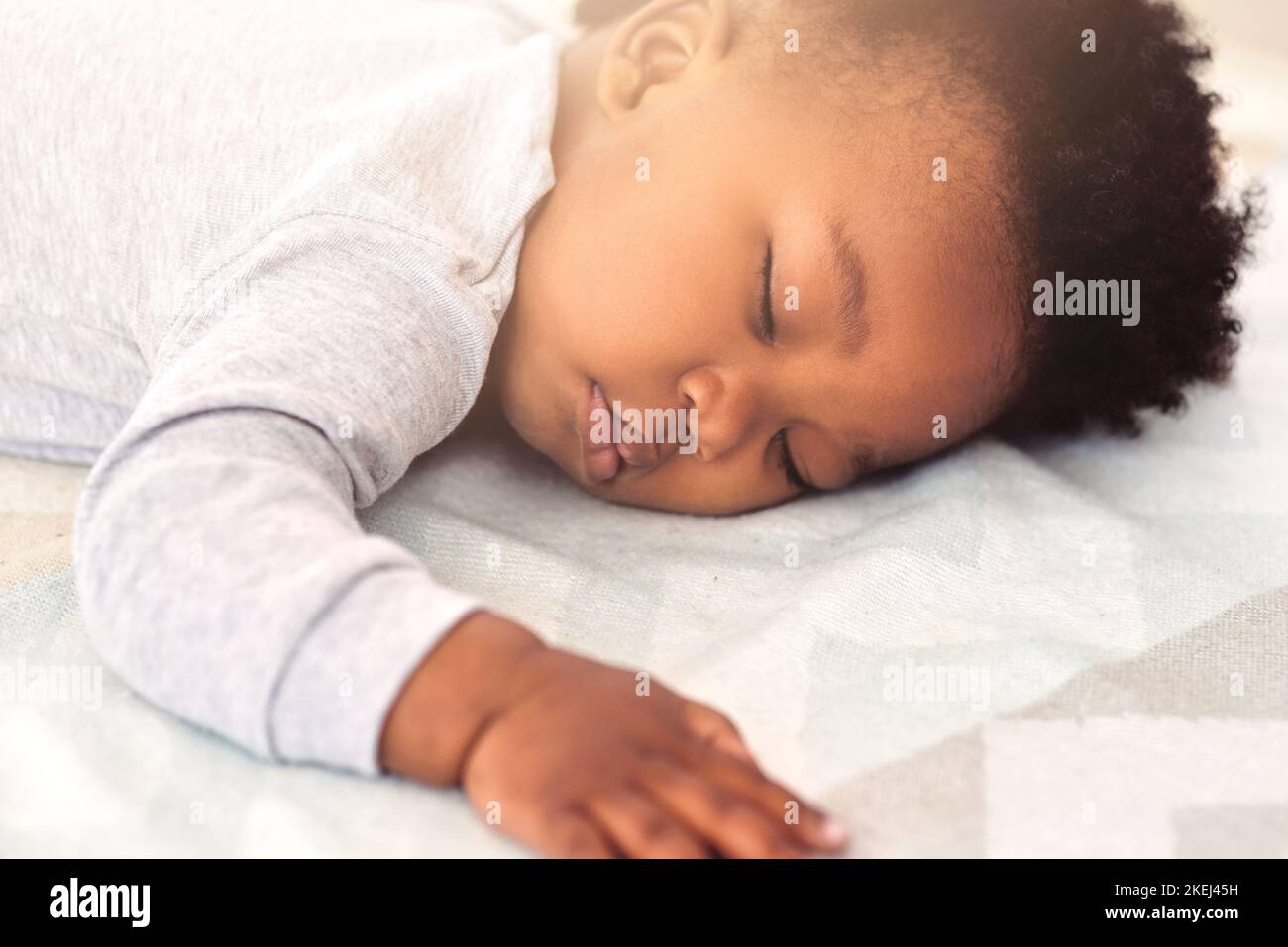 Night night, sleep tight. a little baby boy sleeping on a bed Stock ...