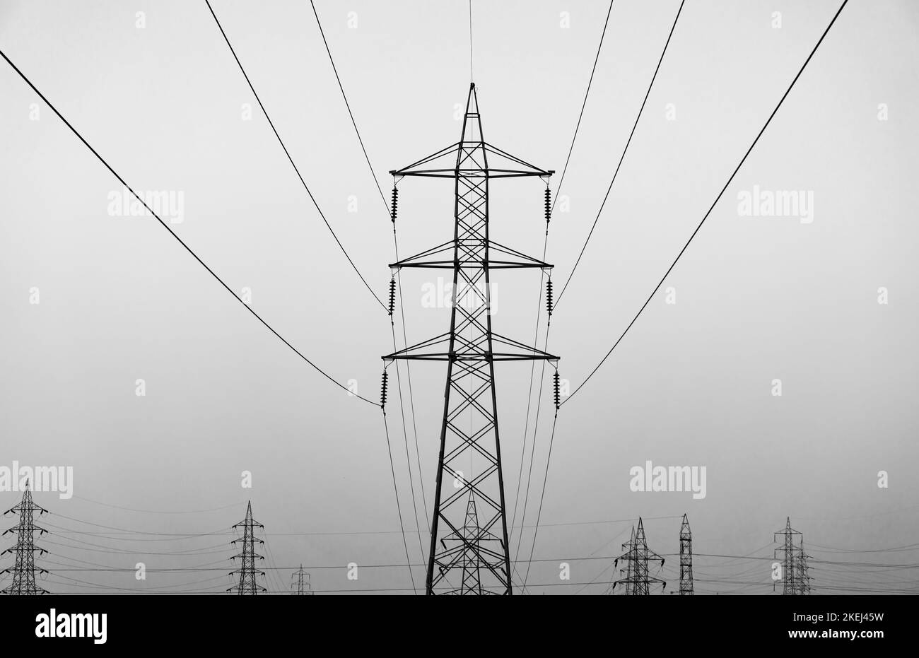 Silhouette of electricity post in the evening with clear sky.High ...