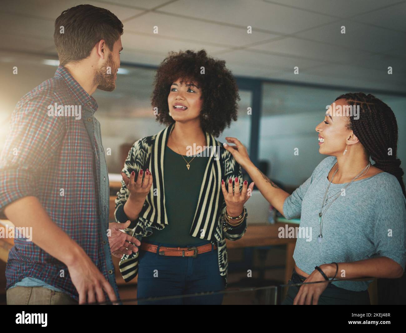 Colleagues talking hi-res stock photography and images - Alamy