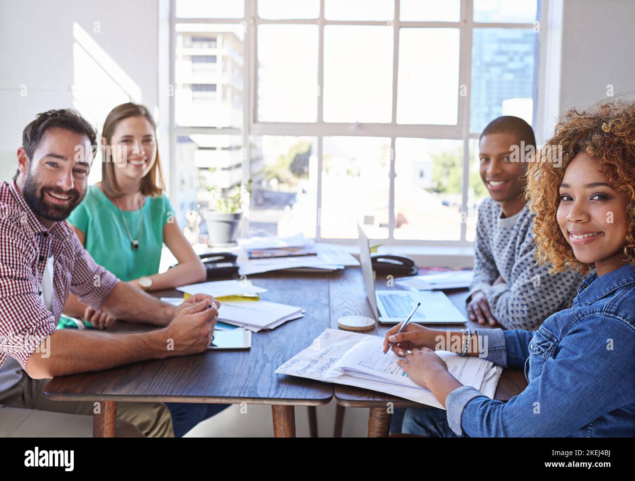Were ready for our meeting. Cropped portrait of a young design team ...