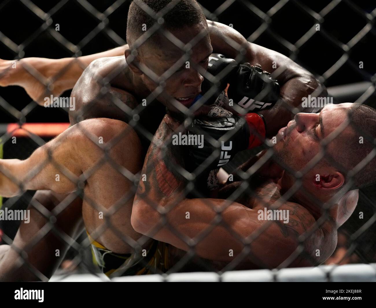 NEW YORK CITY, NY - NOVEMBER 12: Israel Adesanya (top) controls the ...