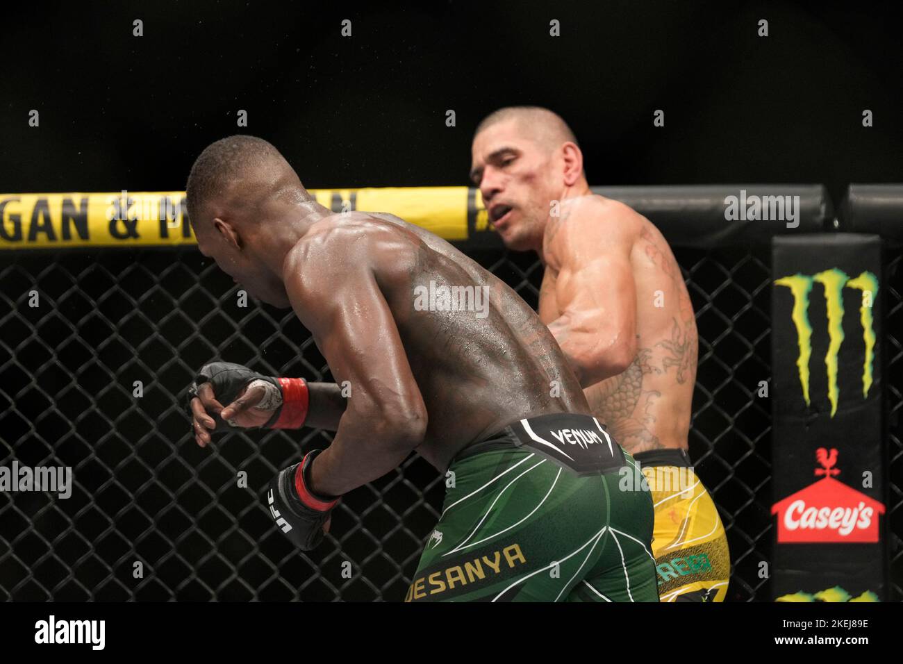 NEW YORK CITY, NY - NOVEMBER 12: (R-L) Alex Pereira punches Israel ...