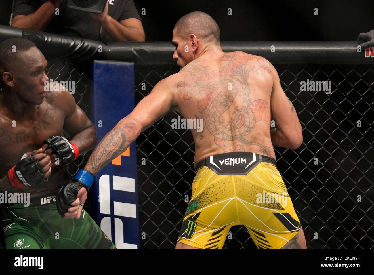 NEW YORK CITY, NY - NOVEMBER 12: (R-L) Alex Pereira punches Israel ...