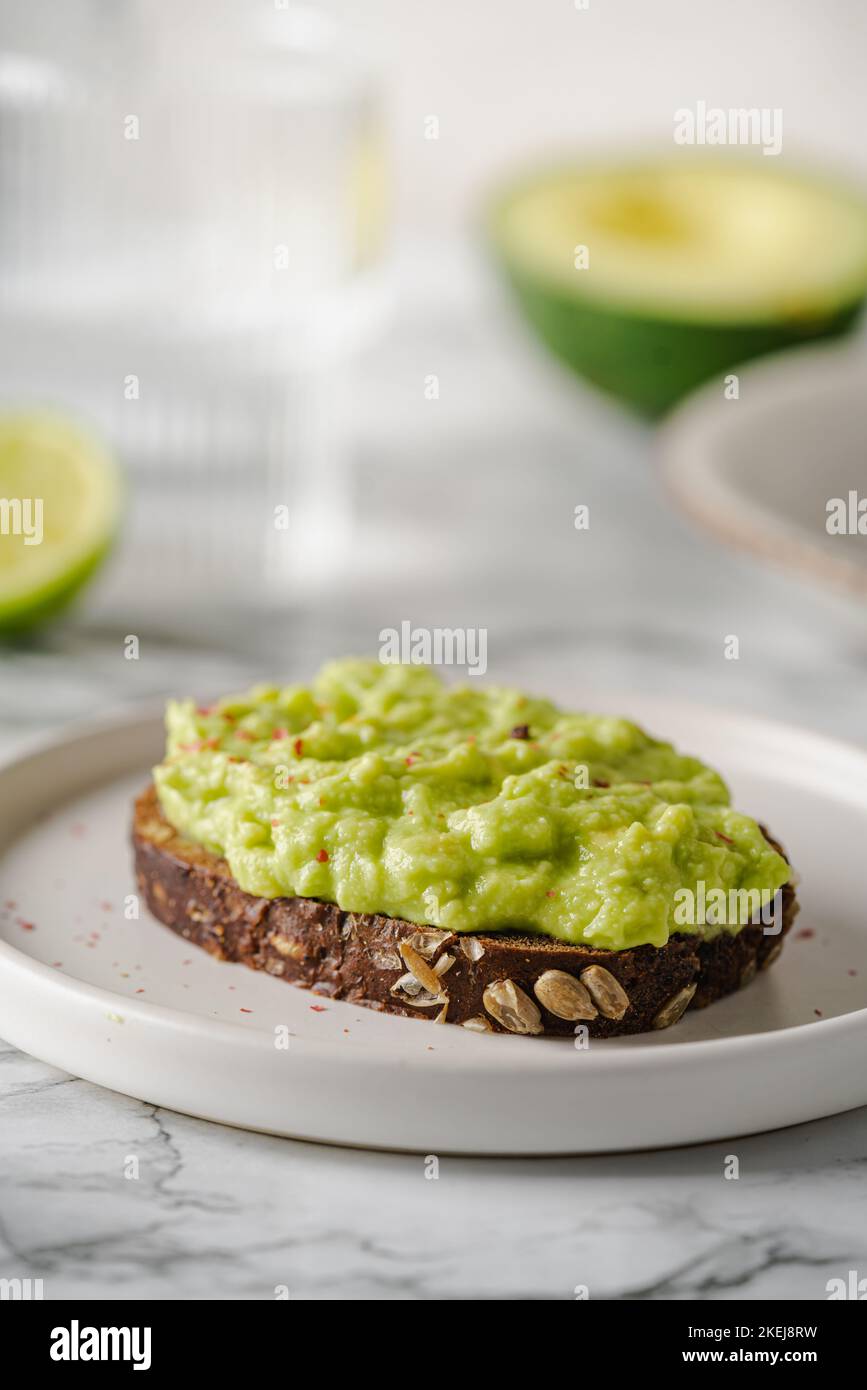 Healthy avocado toasts Stock Photo - Alamy