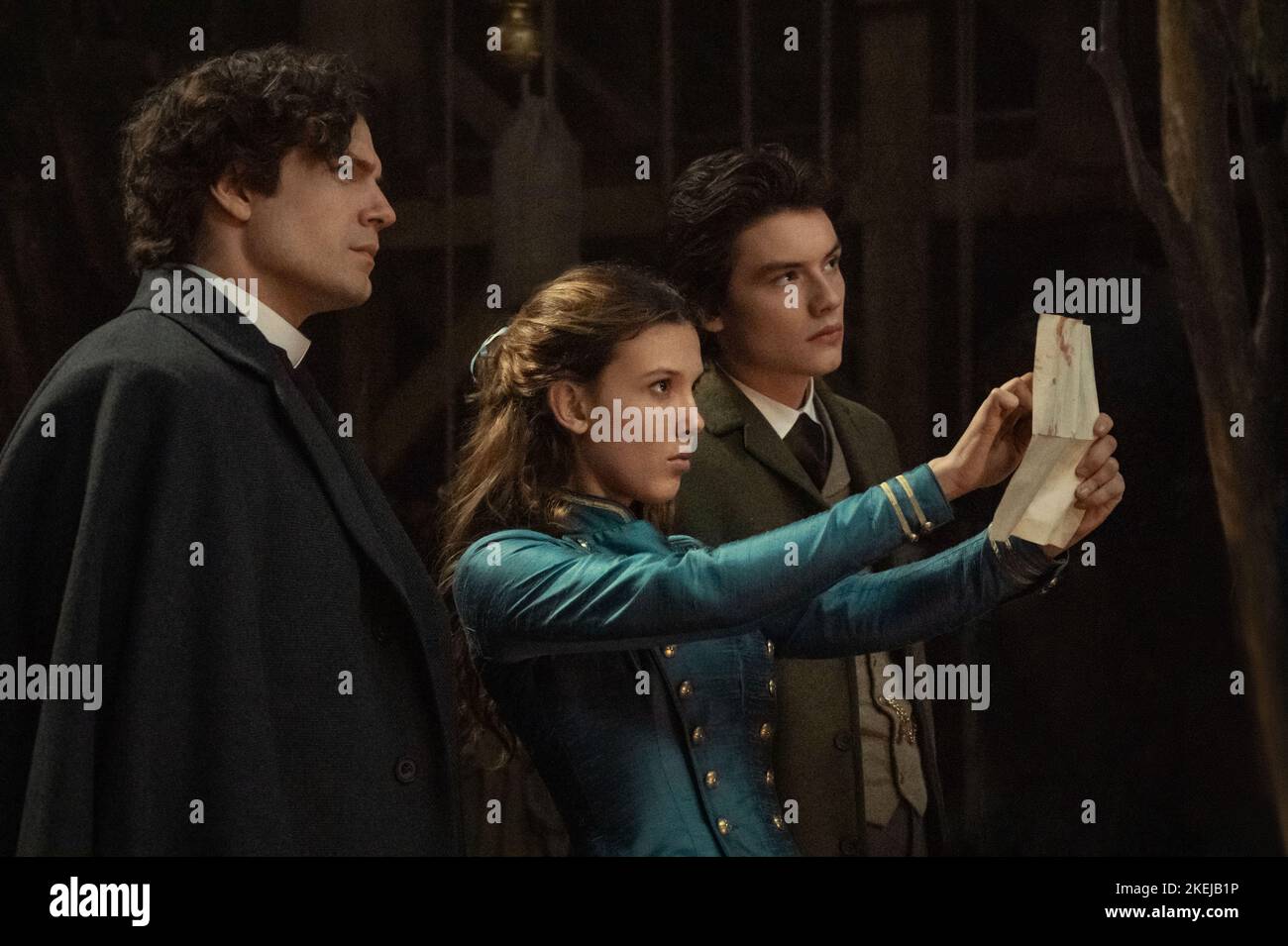 HENRY CAVILL, MILLIE BOBBY BROWN and LOUIS PARTRIDGE in ENOLA HOLMES 2 ...