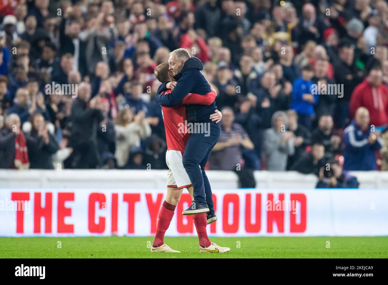 Steve Cooper manager of Nottingham Forest jumps into the arms of Joe ...
