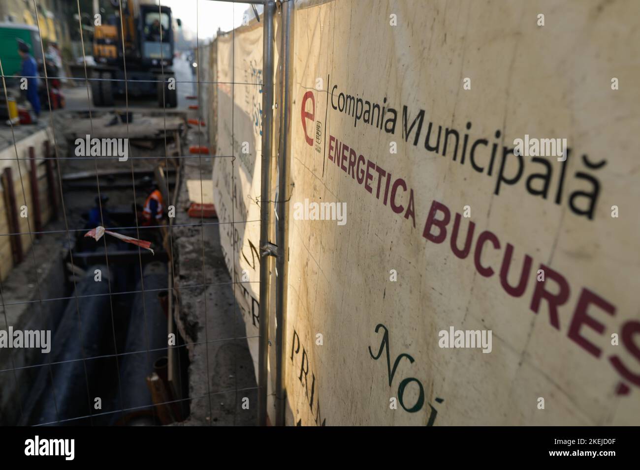 Bucharest, Romania - November 10, 2022: Construction site in the road for workers to repair a ...