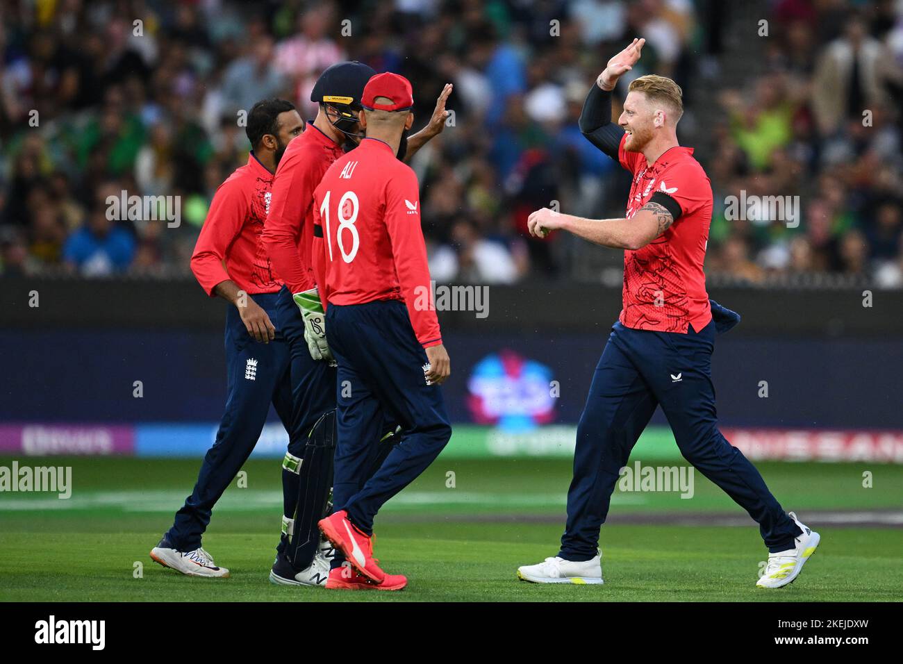 England 's Ben Stokes celebrates taking the catch of Pakistan's ...