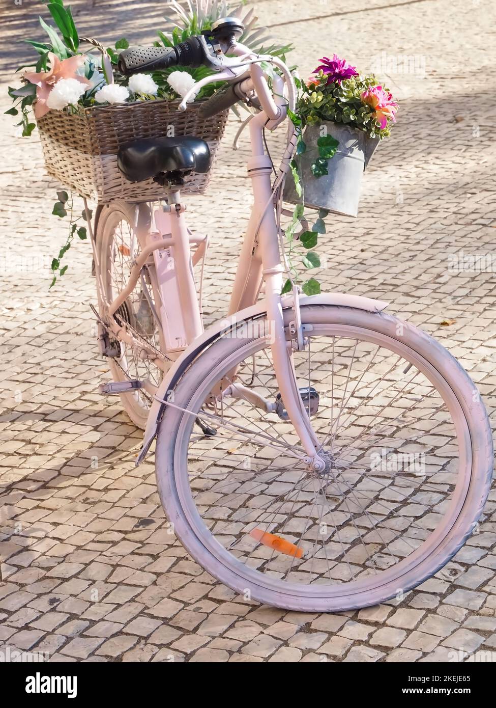 Bicycle vintage and cream with flowers Stock Photo - Alamy