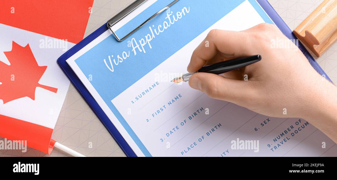 Immigration female hand writing hi-res stock photography and images - Alamy