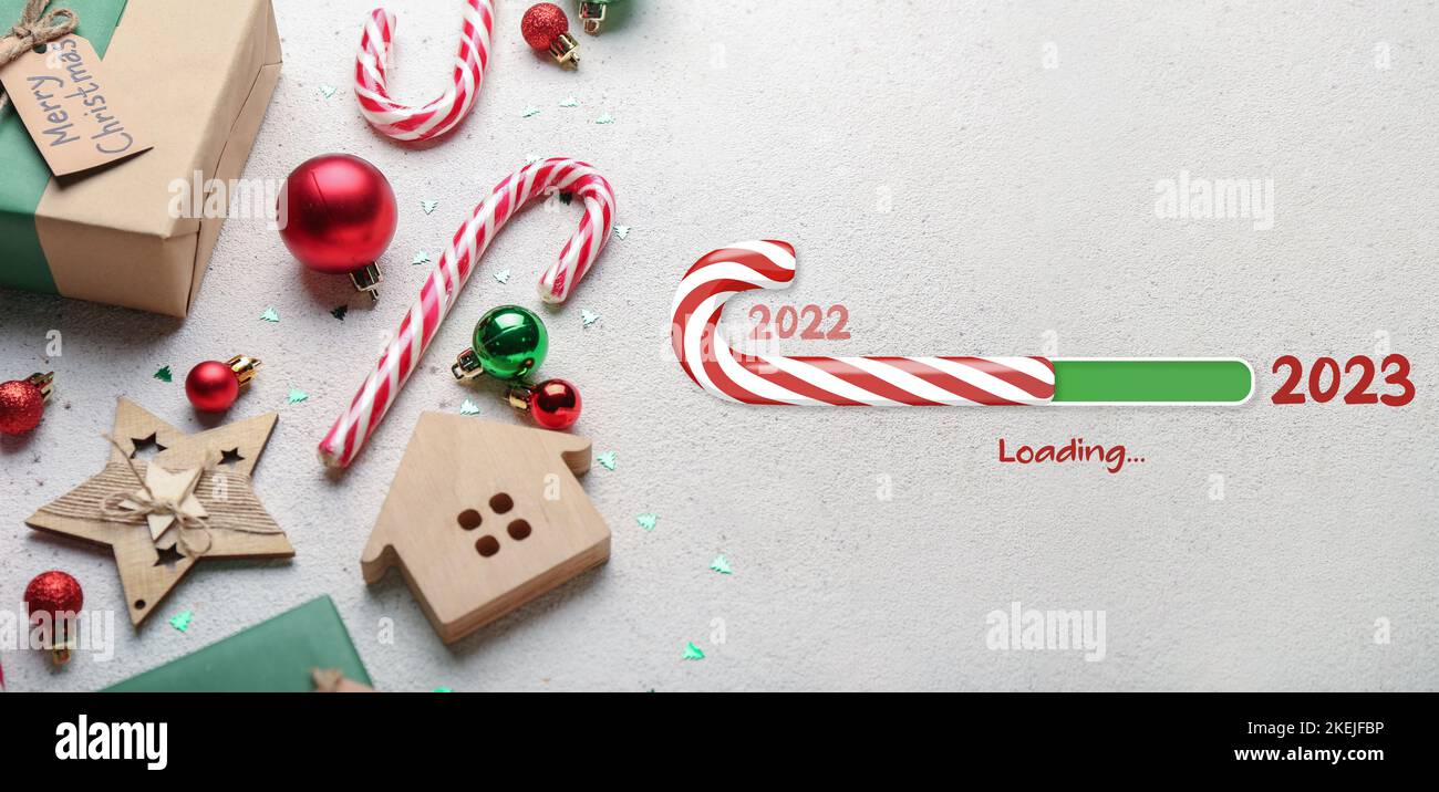 Christmas greeting card with sweet candy canes and decorations on light ...