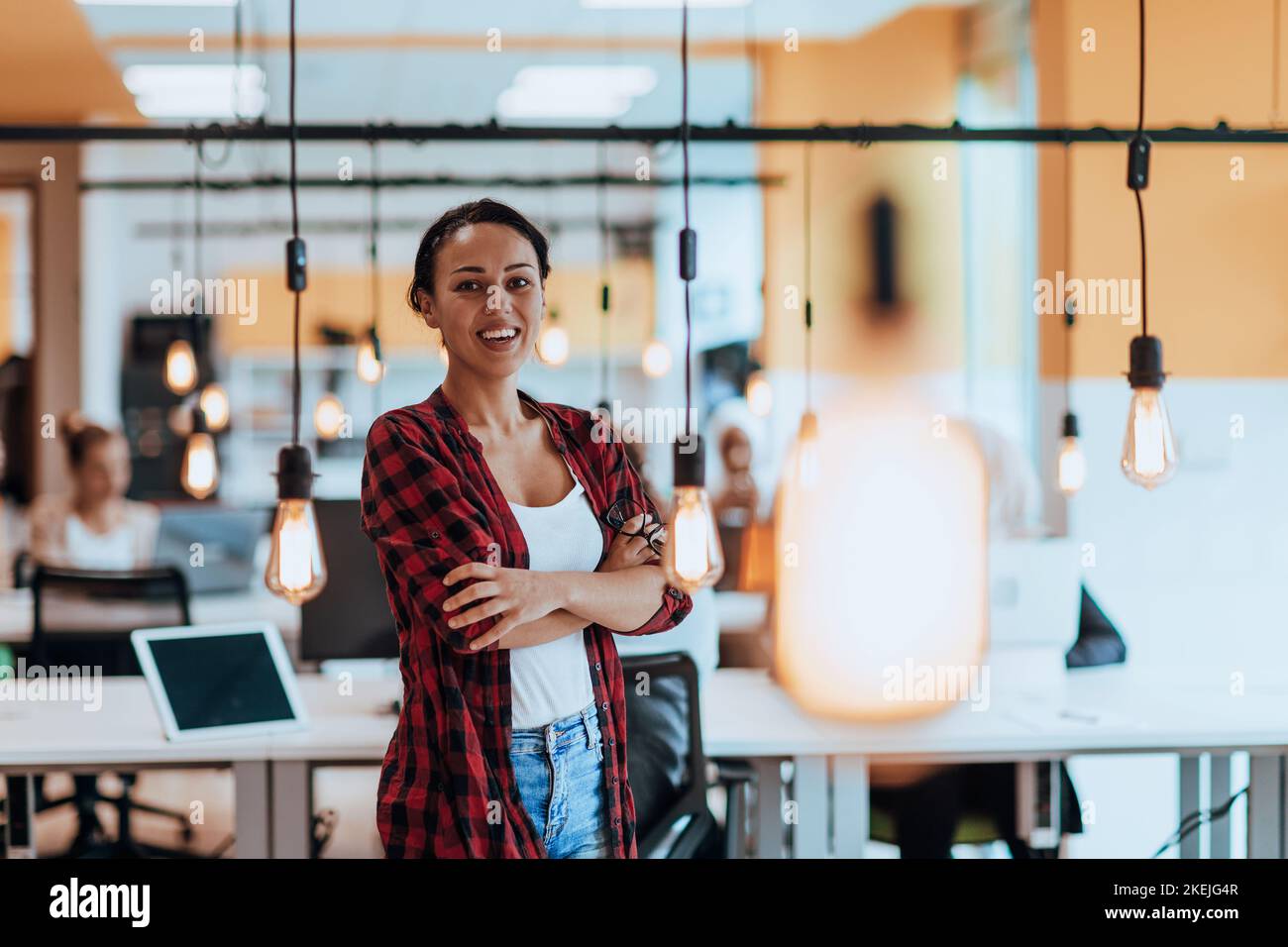 Female boss, manager executive posing in a modern startup office while ...