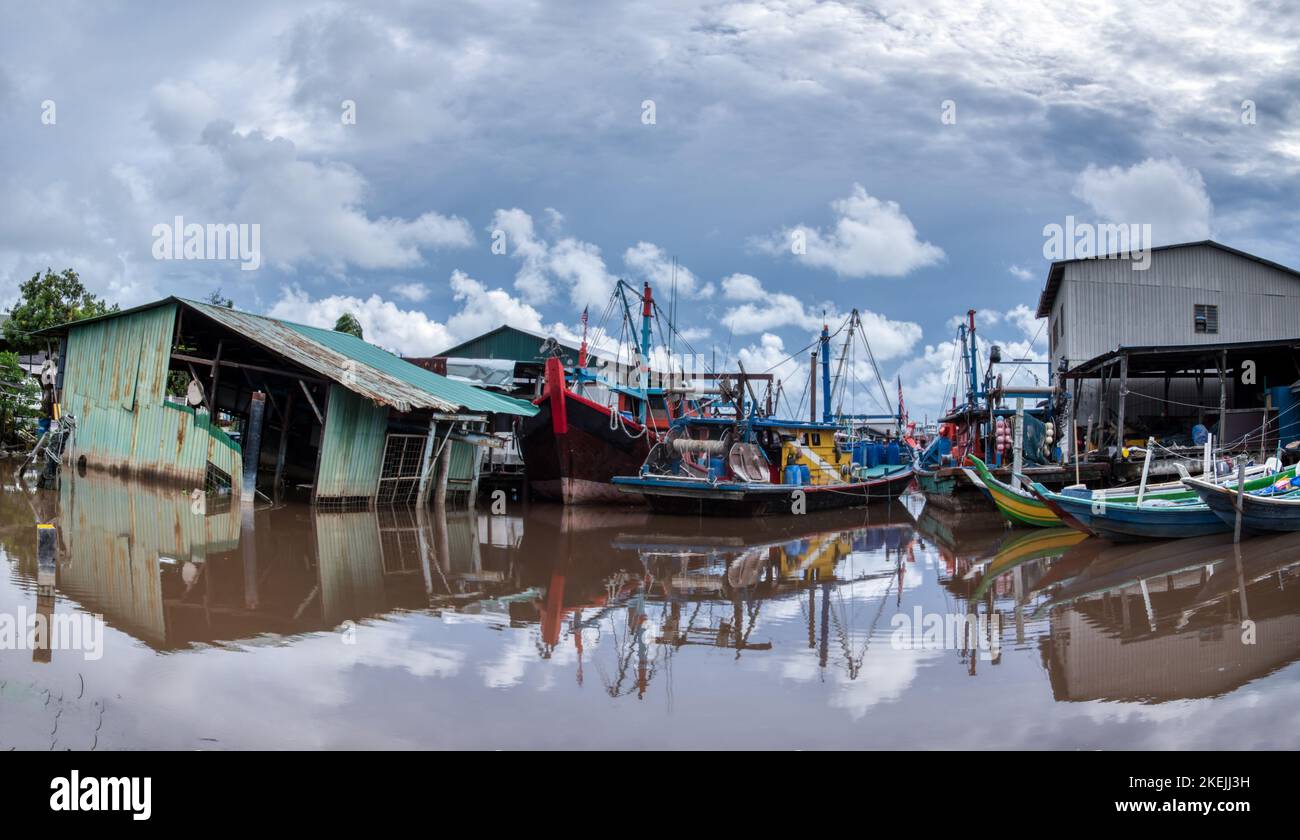 scene of fishing boats harbor at the dock Stock Photo - Alamy