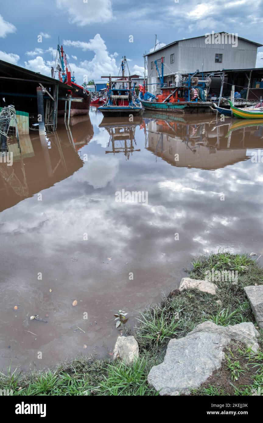 scene of fishing boats harbor at the dock Stock Photo - Alamy