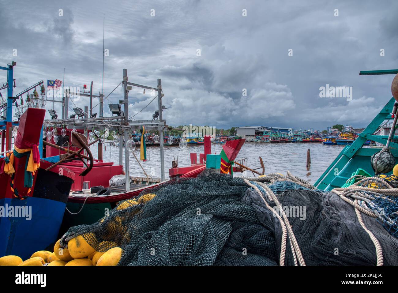 scene of fishing boats harbor at the dock Stock Photo - Alamy