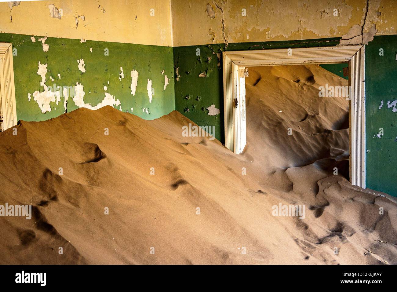 An abandoned house filled with sand Stock Photo - Alamy