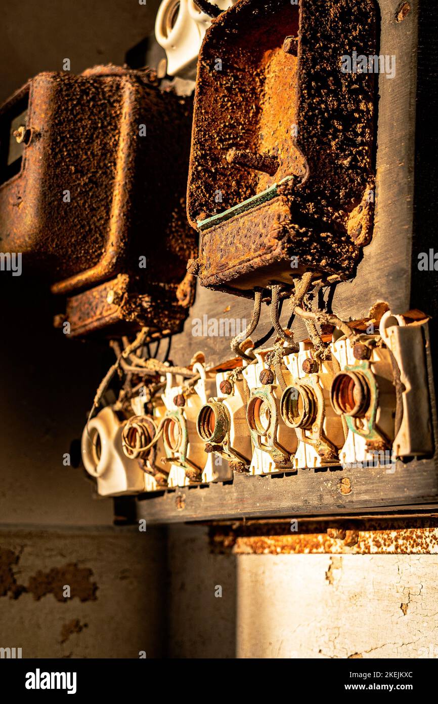 A closeup shot of an old rusty electric wire and fuse Stock Photo - Alamy