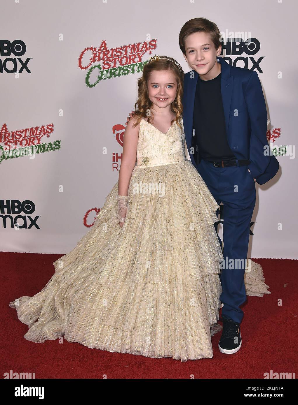 Julianna Layne and River Drosche walking the red carpet at the Warner ...