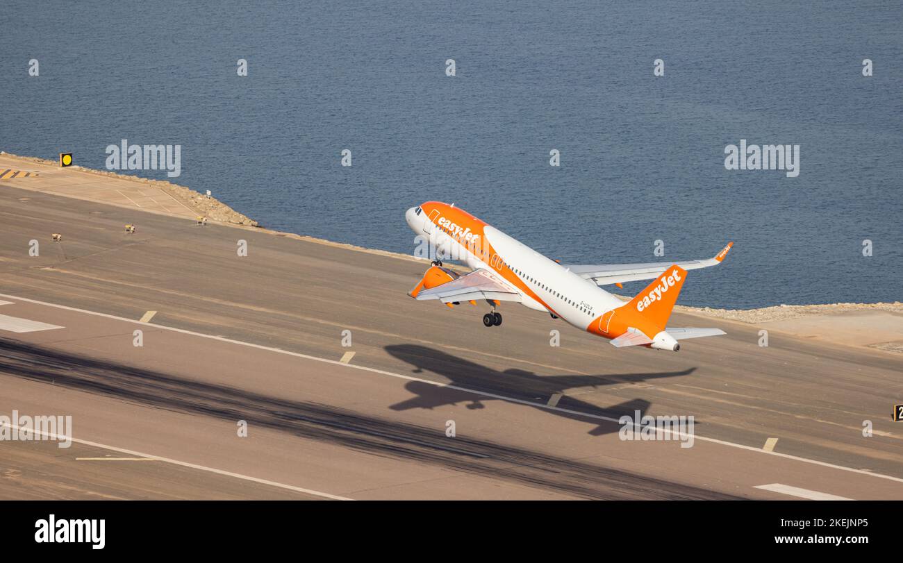 EasyJet Airplane taking off from the airport during morning. Aerial ...