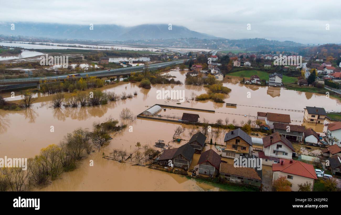 Aerial drone view of torrential rain causes flash floods in residential ...