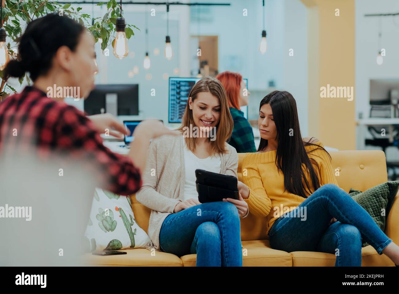 Group of multi-ethnic colleagues working on desktop computers, laptop ...