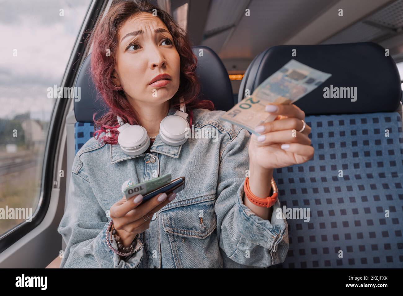 Sad girl on railway hi-res stock photography and images - Alamy