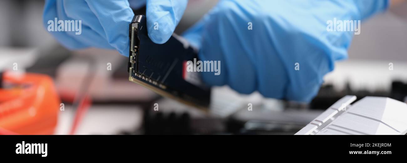 Technician connects CPU microprocessor to motherboard socket Stock Photo - Alamy