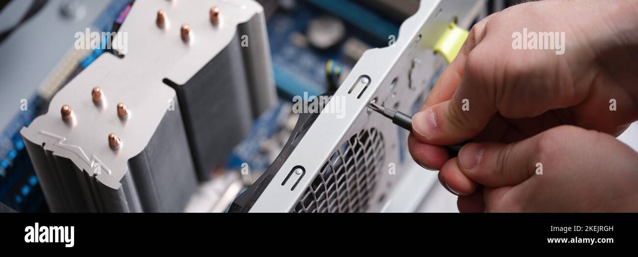 Technician repairing computer power supply closeup, Computer disassembly Stock Photo - Alamy