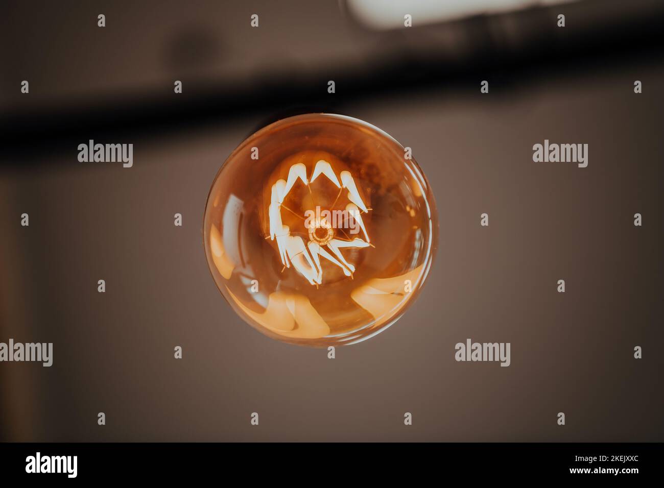 Light bulb illuminated and taken from above Stock Photo - Alamy